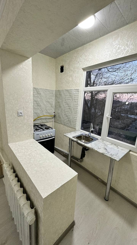 Продаётся квартира 1/4/4 Буз-2(бывщая общежития), Эко базар