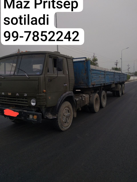Maz pritsep sotiladi 12 metr yarim tirkama bortli xolati yaxshi