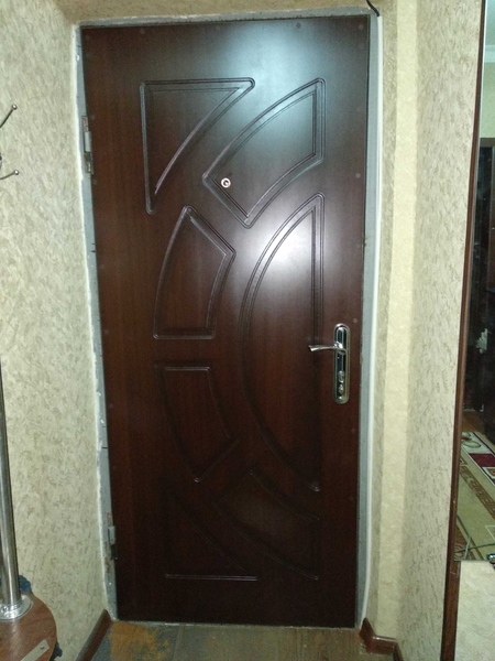Обшивка металлических дверей