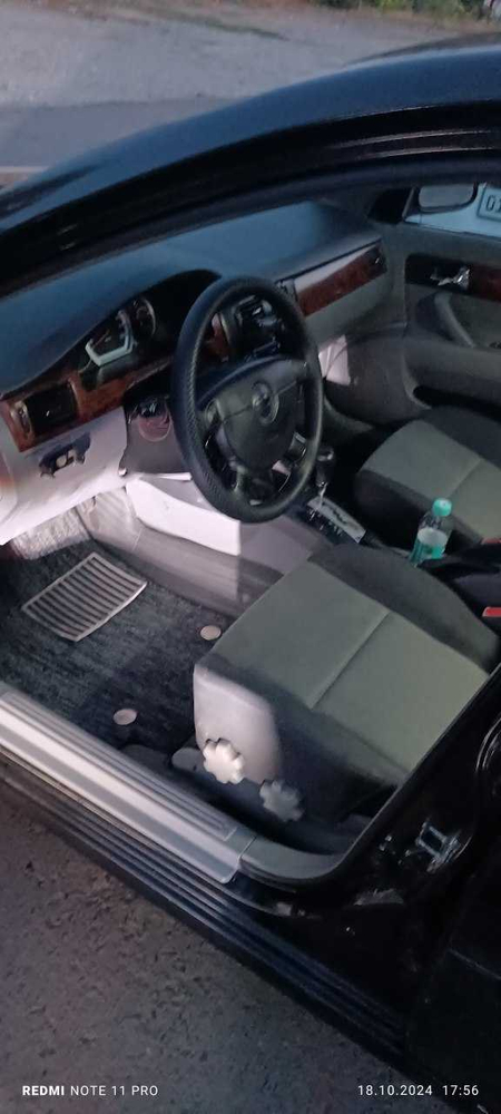 Lacetti avtomat 1,8 Qora 2011