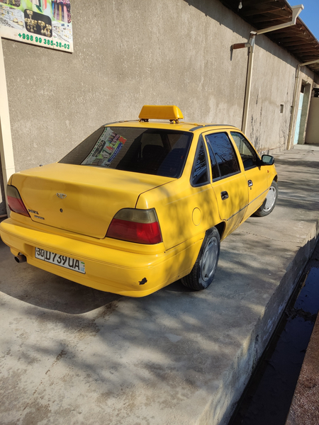 Nexia 1 sariq 2002