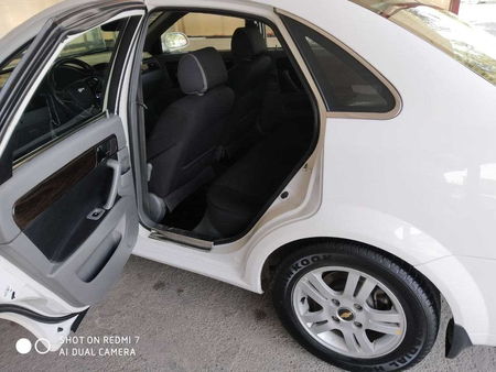 Lacetti 1.6 2013год 3 поз.автомат 9200 у.е. Белый