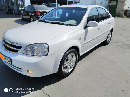 Lacetti 1.6 2013год 3 поз.автомат 9200 у.е. Белый