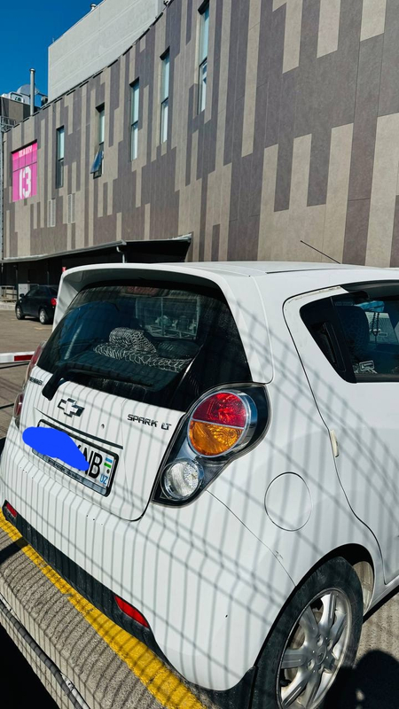 Spark oq 2011 yil 209000 probeg