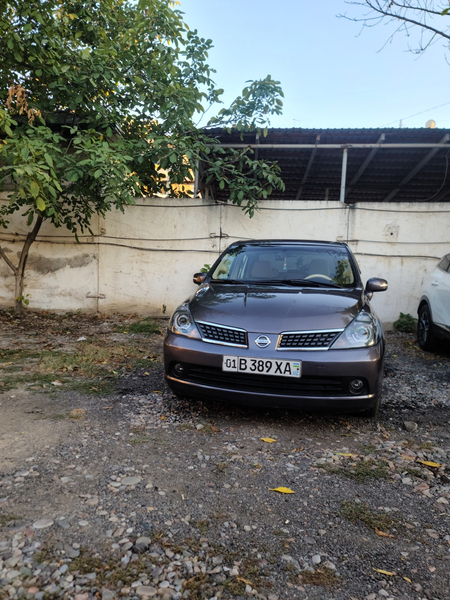 Nissan tiida продам не спеша. До рестайлинг. Цвет баклажан