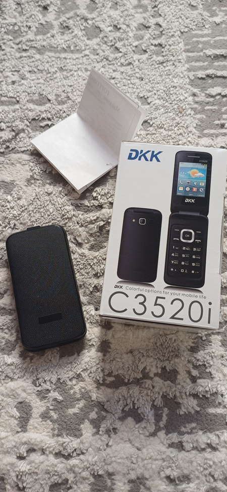 Продаю мобильный телефон Dkk