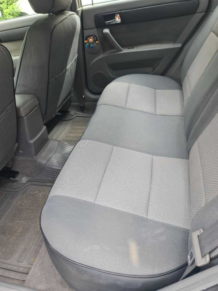 Продается автомобиль Lacetti белого цвета, 2011г.