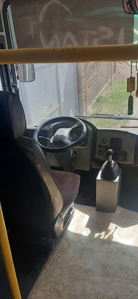 Isuzu автобус.  NP21.    2012-йил.  285минг км йурган.