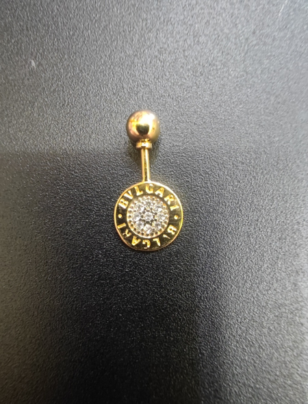 Золотой пирсинг  Bvlgari