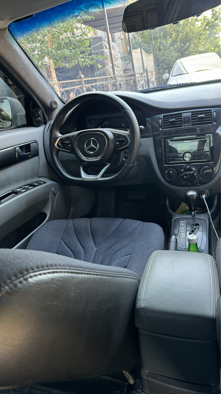 Lacetti 2009 avtamat ideal holaganlaga