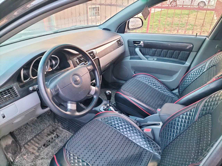 Лачетти 1,8. 3- позиция автомат  2012 год. пробег 126000.