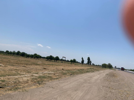 М-39  трасса бўйида  35 соту  Мехмонхона Заправка ва х.к лар учун жой