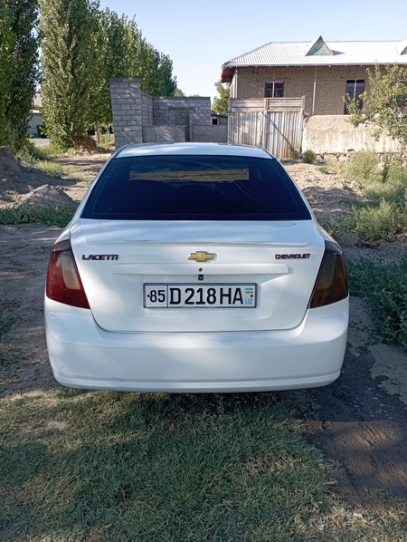 Ласетти 1.8 холати яхши