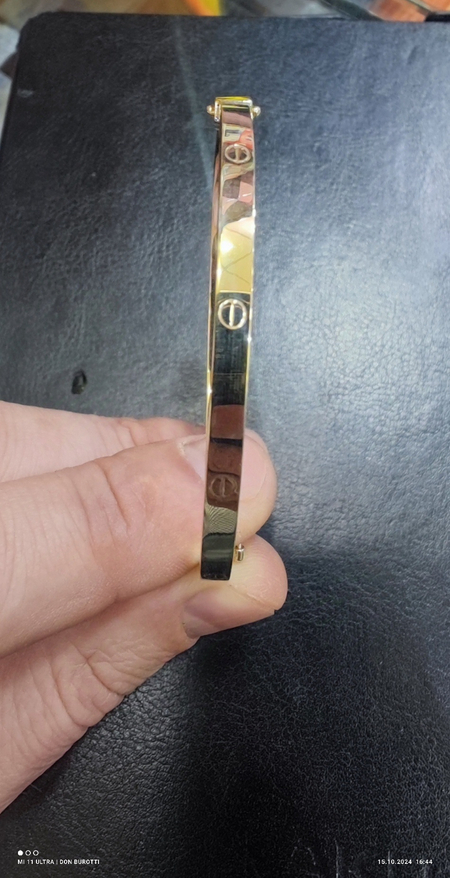 Женский золотой браслет Cartier