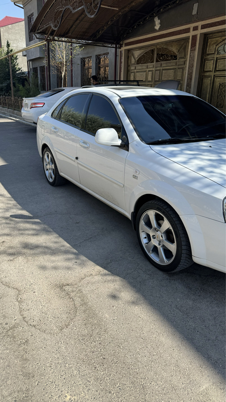 Lacetti 2009 avtamat ideal holaganlaga