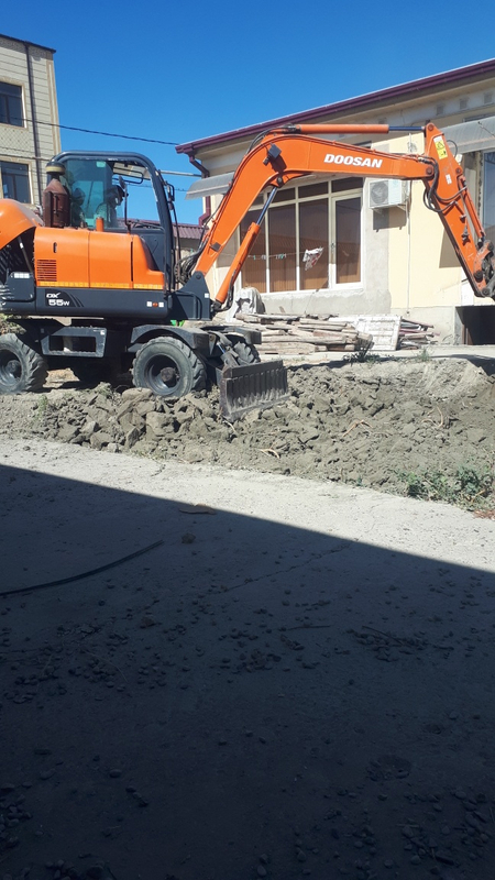 экскаватор doosan 55w  калёсный мини сотилади