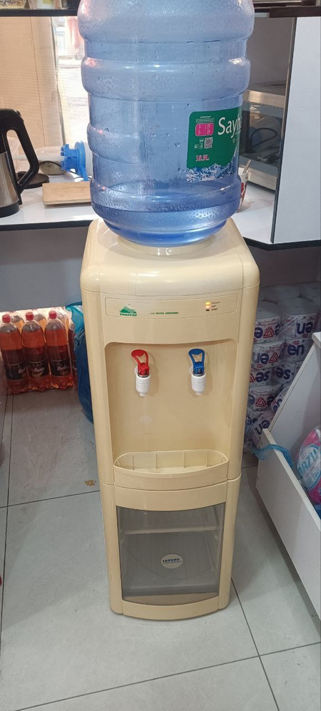 Кулер для воды Б/У. Состояние нормальное,  работает без проблем.