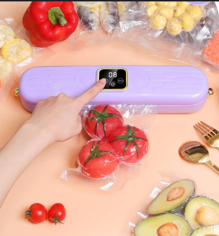 Вакуумный упаковщик для пищевых продуктов.