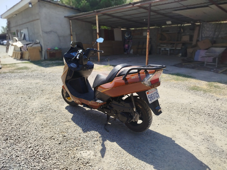 Продам скутер макси Делим