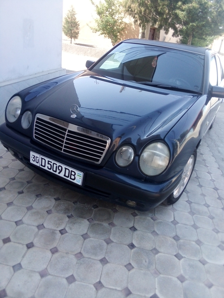 Мерседес Бенс 210