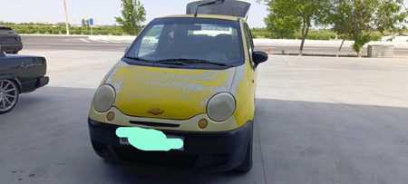 Matiz Chevrolet желтый