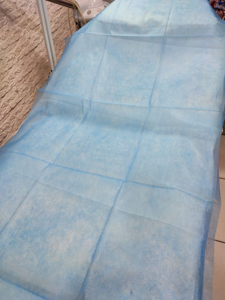 Простыни в ролоне