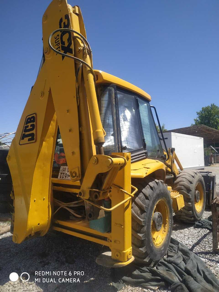 Экскаватор погрузчик JCB 4CX 14H2WM