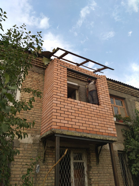 Кирпичная кладка балконов