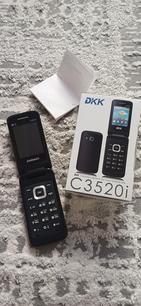 Продаю мобильный телефон Dkk