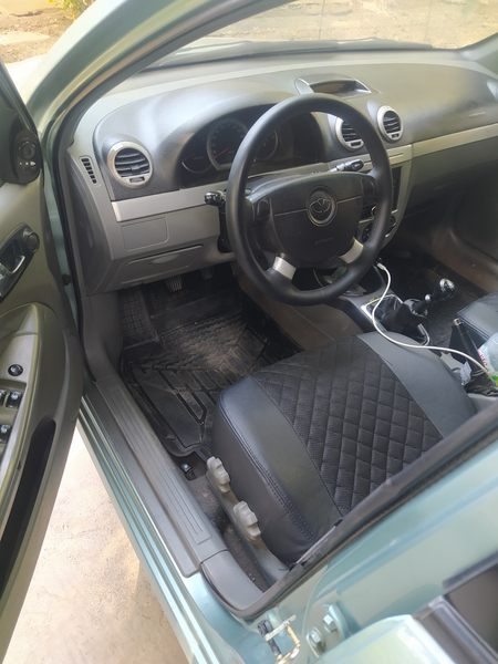 Lasetti 2005 kareya 330000 yurgan 2 ta detalda kraska bor 6900 varyat