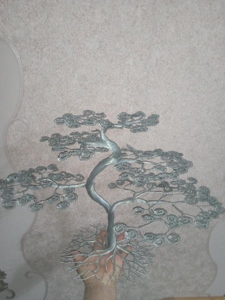 Sun\\\'iy daraxt.Simdan yasalgan.Uzunligi taxminan 40cm.