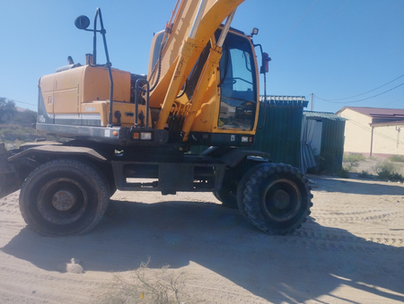 Экскаватор Hyundai 140w 2013 вариант бор