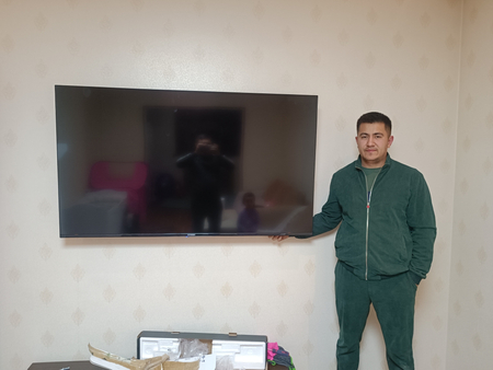 Установка телевизора на кранштейн