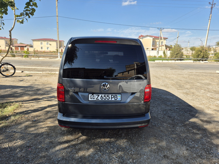 Машина Volkswagen Caddy