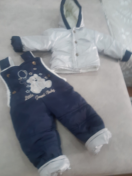 Продам  тёплый комбинезон на мальчиков.
