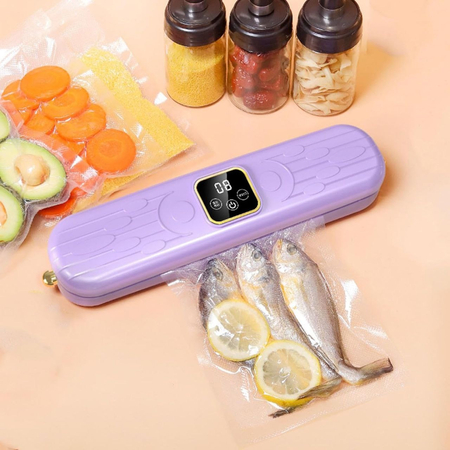 Вакуумный упаковщик для пищевых продуктов.