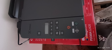 Prentr canon holati yangi
