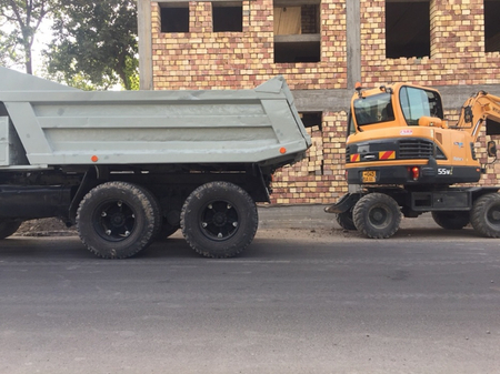 Услуга КамАЗ и экскаватор Hyundai 55W