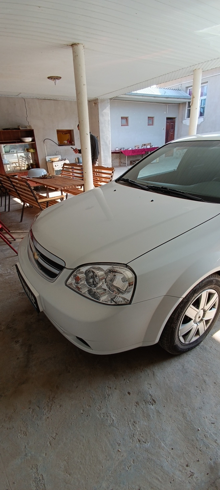 Lasetti 1.8 oq kraska toza moshina tiniq holatda