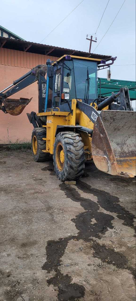 экскаватор погрузчик XCMG 30-25