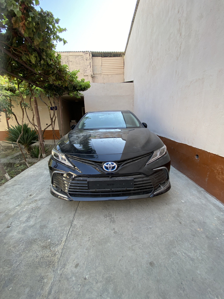 toyota camry hybrid 2023 yil