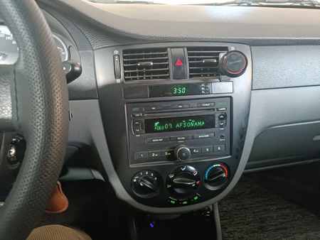 Lasetti 1.8 oq kraska toza moshina tiniq holatda