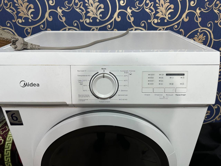 Midea стриальная машина