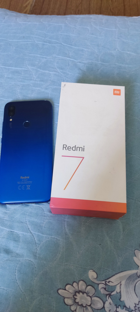 Redmi 7  obmen mening doplata bilan  , karobka bor
