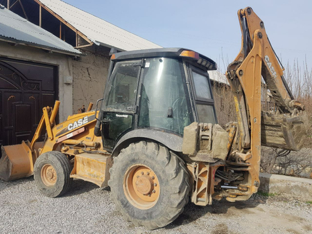 Ekskavator pogruzchik. Case 580m. Series 3. Jostik
