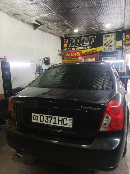 Ласетти 1,6 автомат 2013г