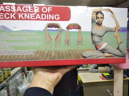 Массажер (Massager of neck kneading)