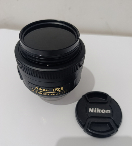 Nikon abektif xolati idyal