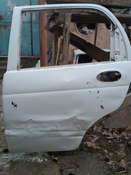 Matiz eshik chap orqasi holati rasmdagidek