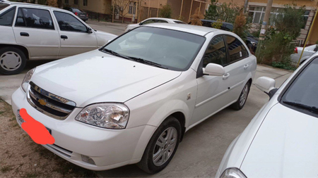 lasetti 2 pozitsiya 2010 yil oq metani bor 151000 km yurgan